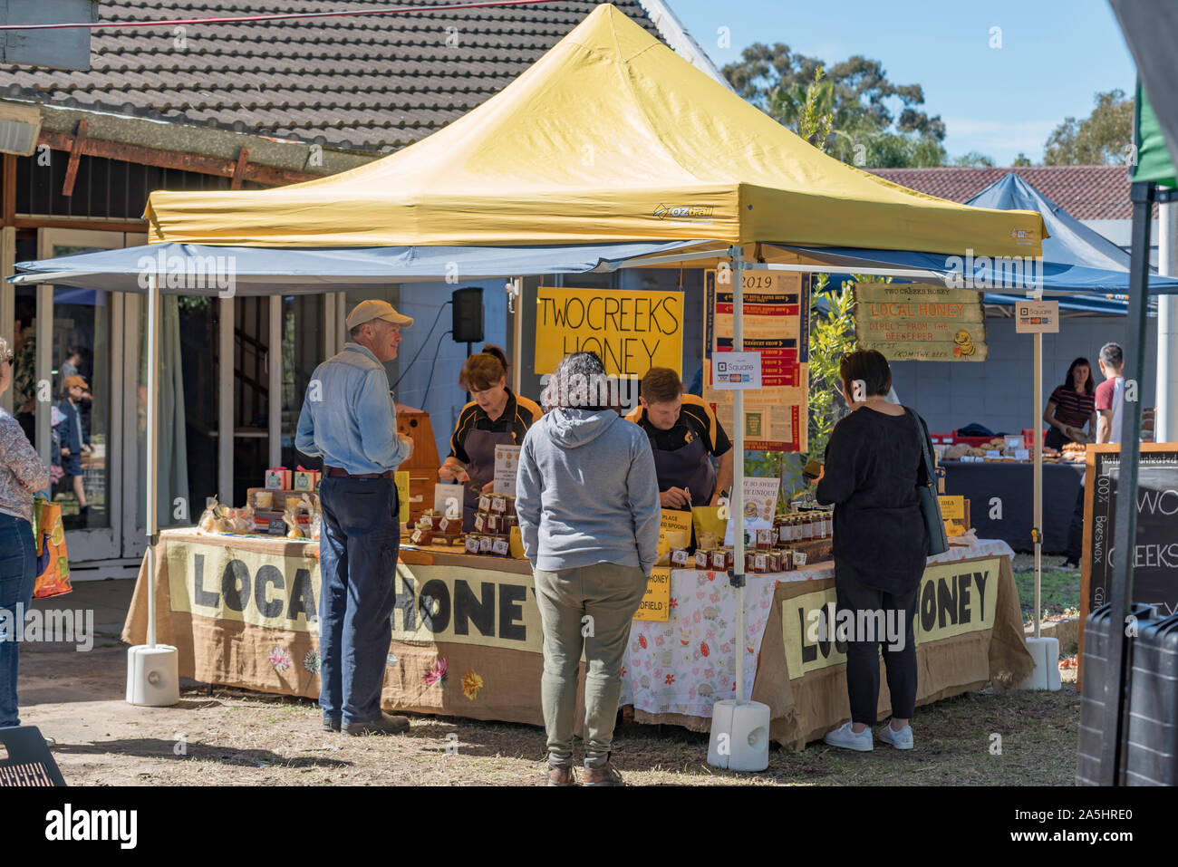 People attending and shopping at a local weekend market in the Sydney ...