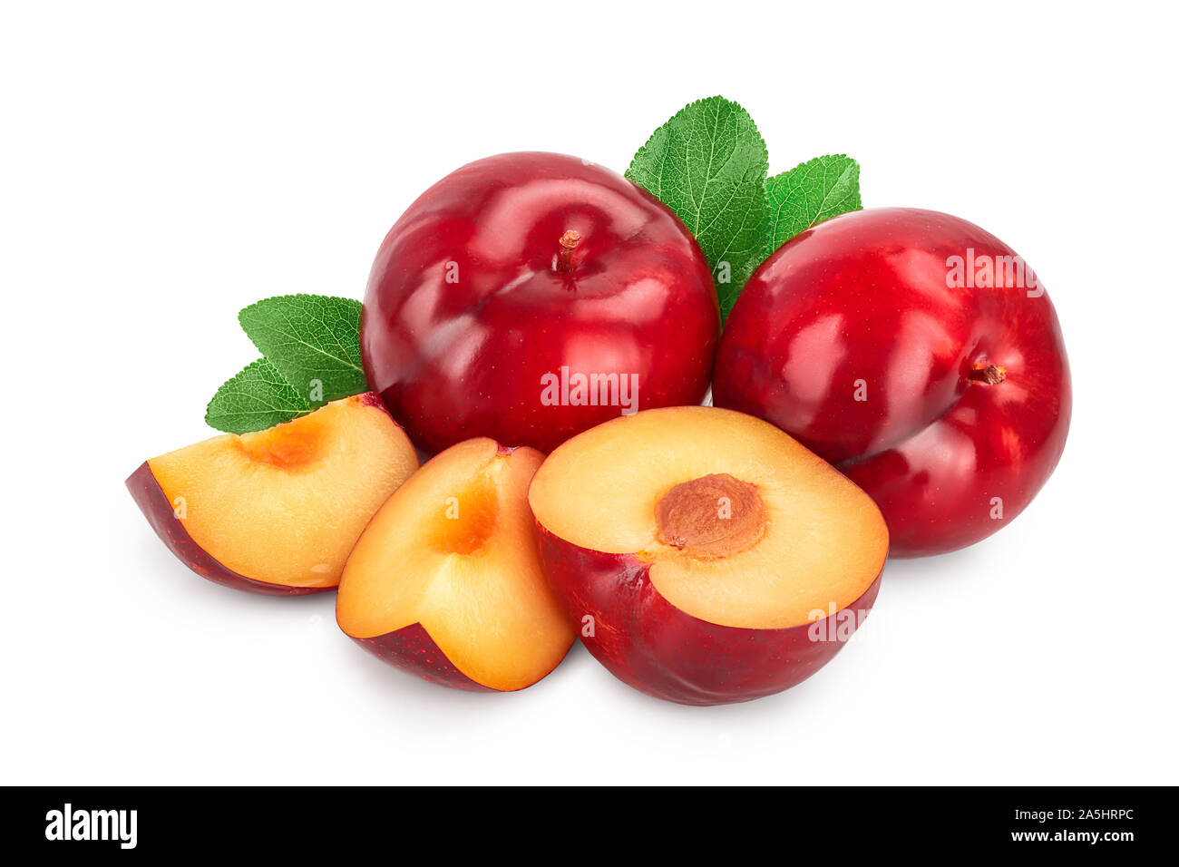 fresh red plum and slice with leaves isolated on white background Stock ...