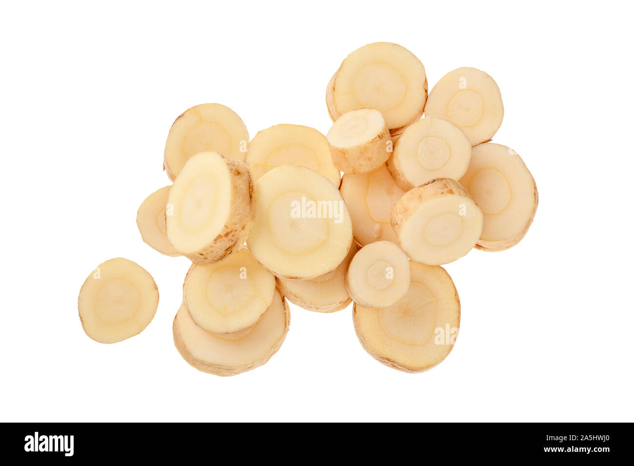 Parsnip root slice isolated on white background closeup. Top view. Flat ...