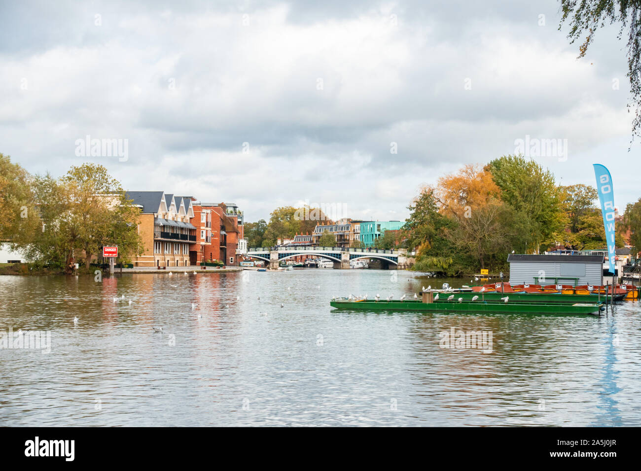 A view down the River Thames at Windsor towards The Eton Bridge Stock ...