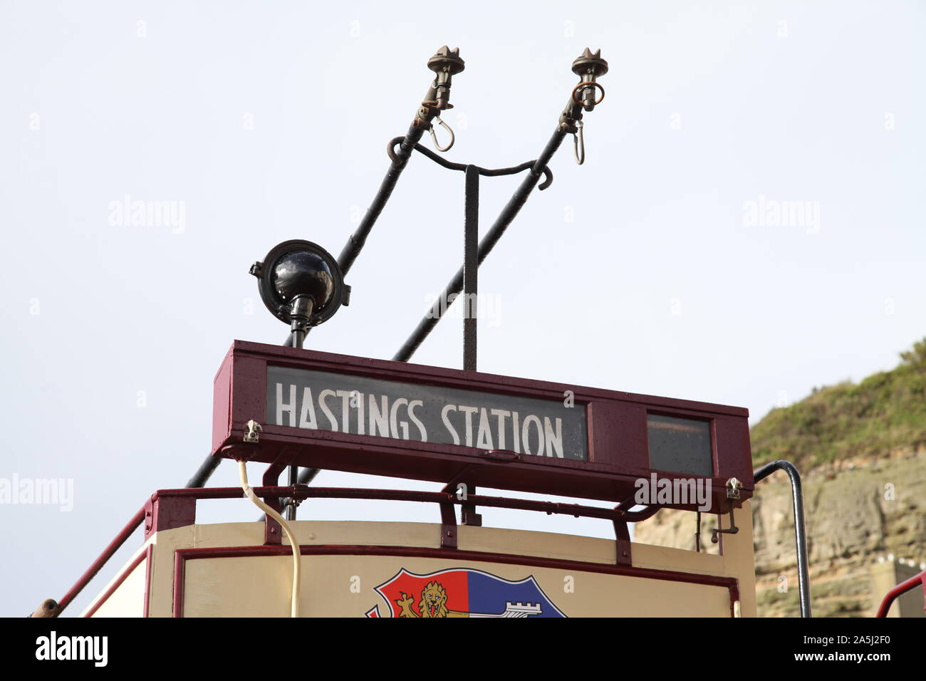 Close up of electric tram roof sign on Hastings sea front, travelling ...