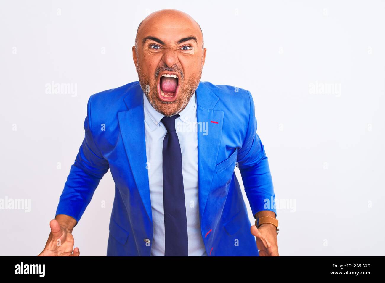 Middle age businessman wearing suit standing over isolated white ...