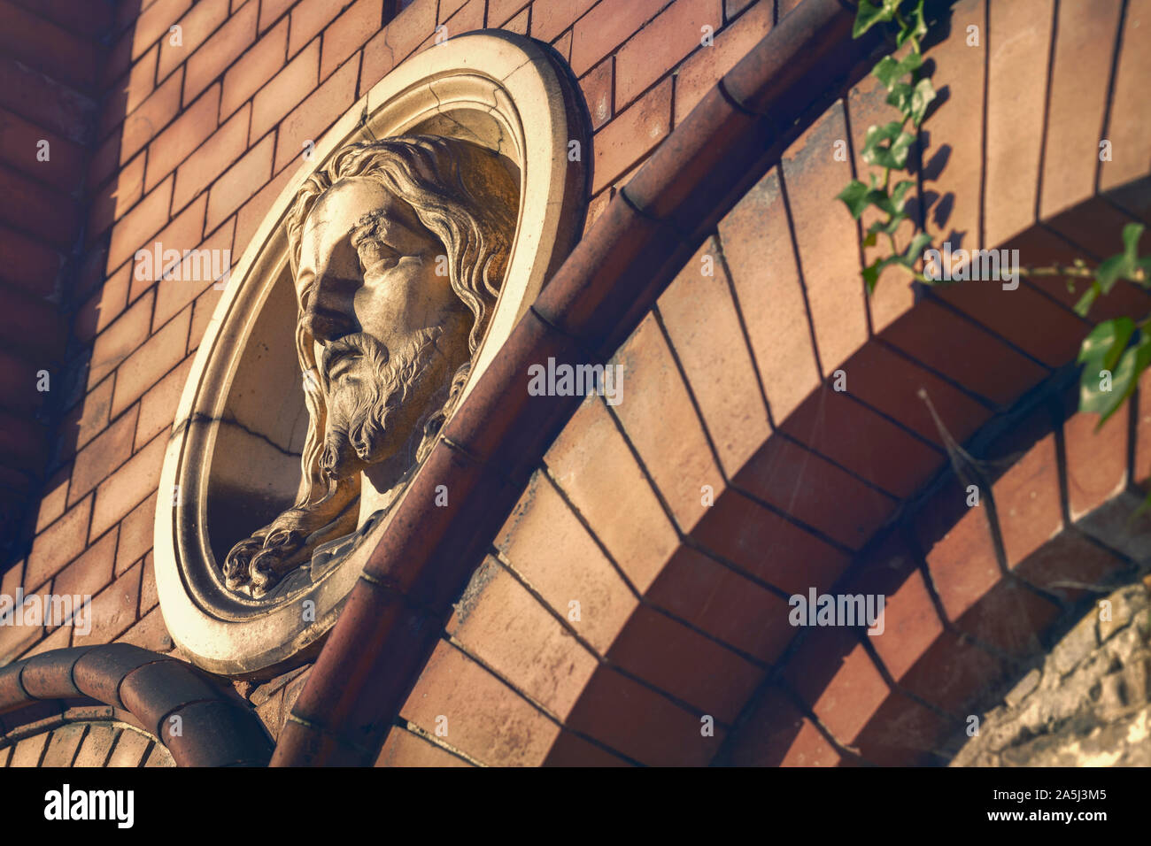 detail of a tomb, the face of Jesus. Unknown artist of the 19th century ...