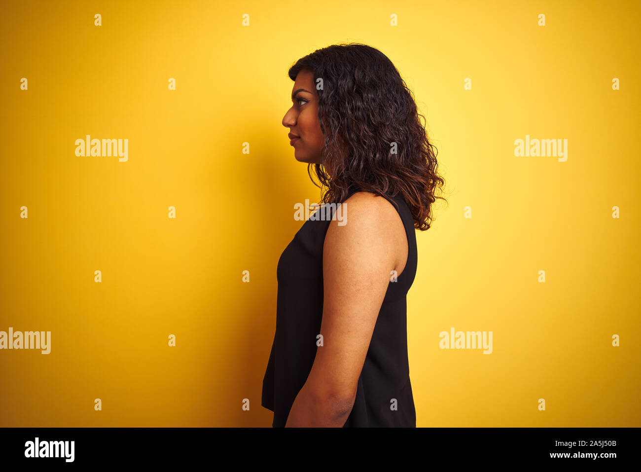 Transsexual transgender elegant businesswoman standing over isolated ...