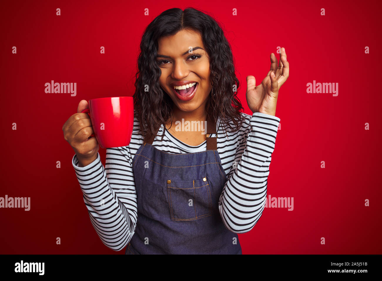 Transsexual transgender barista woman holding cup of coffee over ...