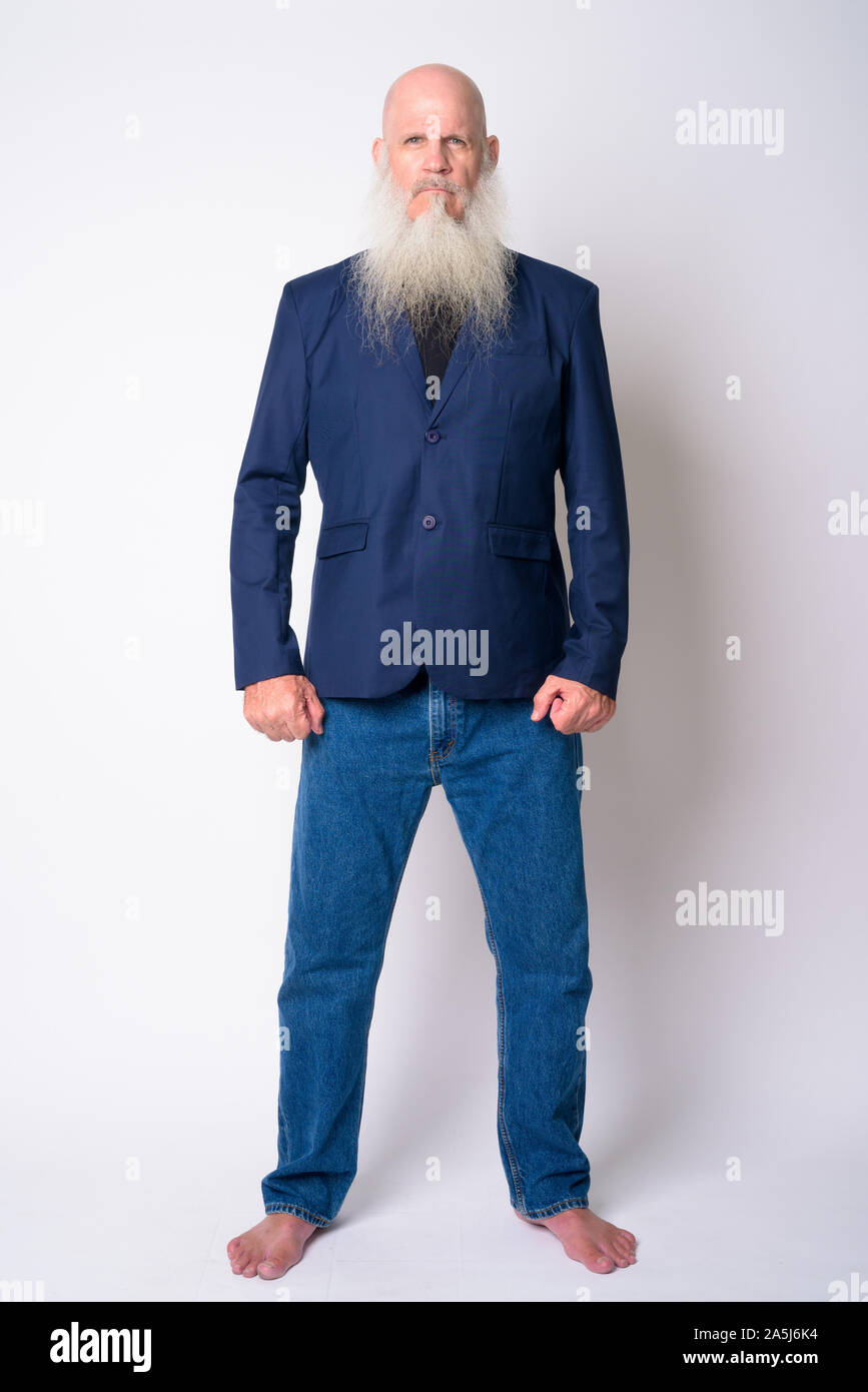 Full body shot of mature bearded bald businessman in suit Stock Photo ...