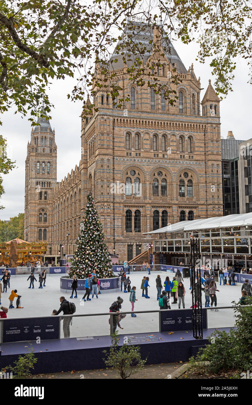 An ice rink set up in front of the Natural History Museum in London ...