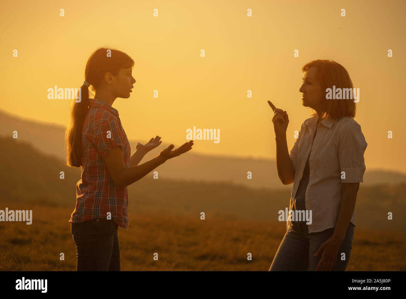 Grandmother and granddaughter are arguing Stock Photo - Alamy