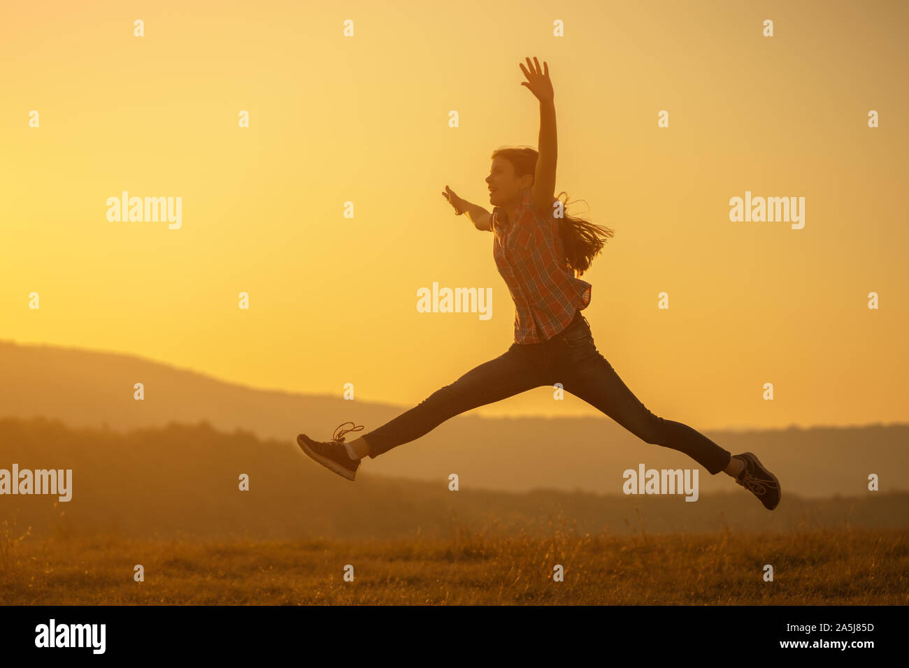 Child jumping silhouette hi-res stock photography and images - Alamy