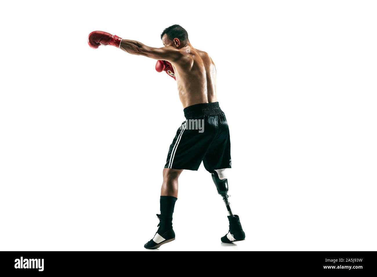 Full length portrait of muscular sportsman with prosthetic leg, copy ...