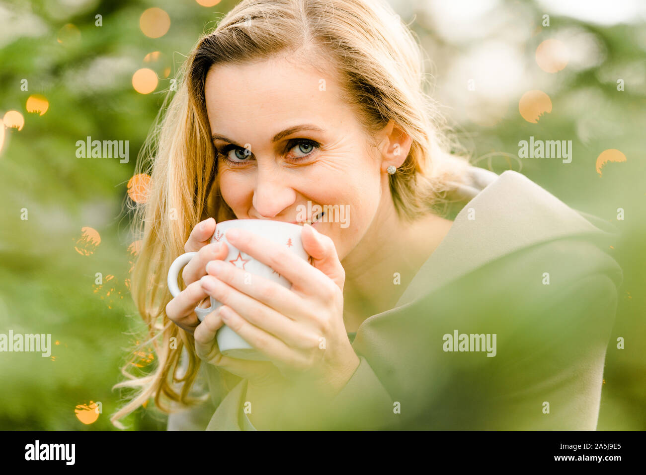 Woman sipping tea hi-res stock photography and images - Alamy