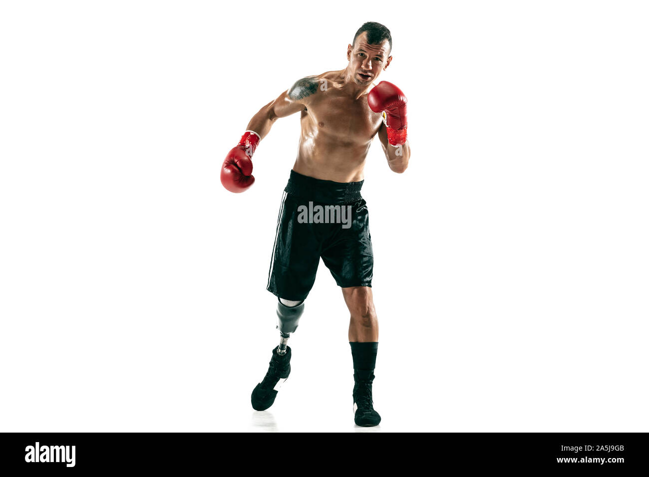 Full length portrait of muscular sportsman with prosthetic leg, copy ...