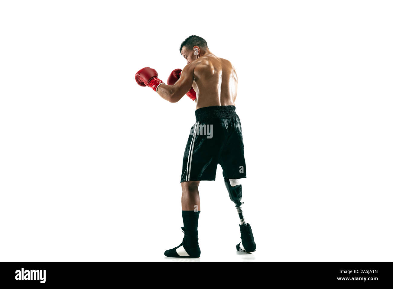 Full length portrait of muscular sportsman with prosthetic leg, copy ...