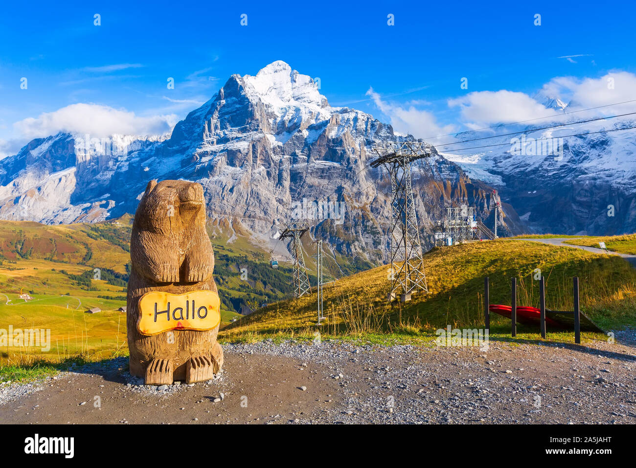 Grindelwald First, Switzerland marmot statue with Hallo sign, aerial ...