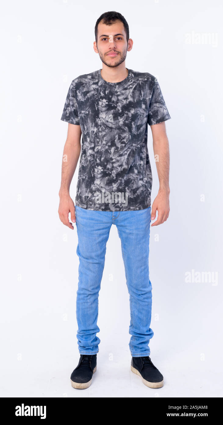 Full body shot of young bearded Persian man Stock Photo - Alamy