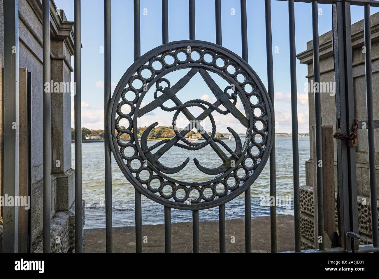 Locked gates with steps to the Hamoaze at the Royal William Yard an ...