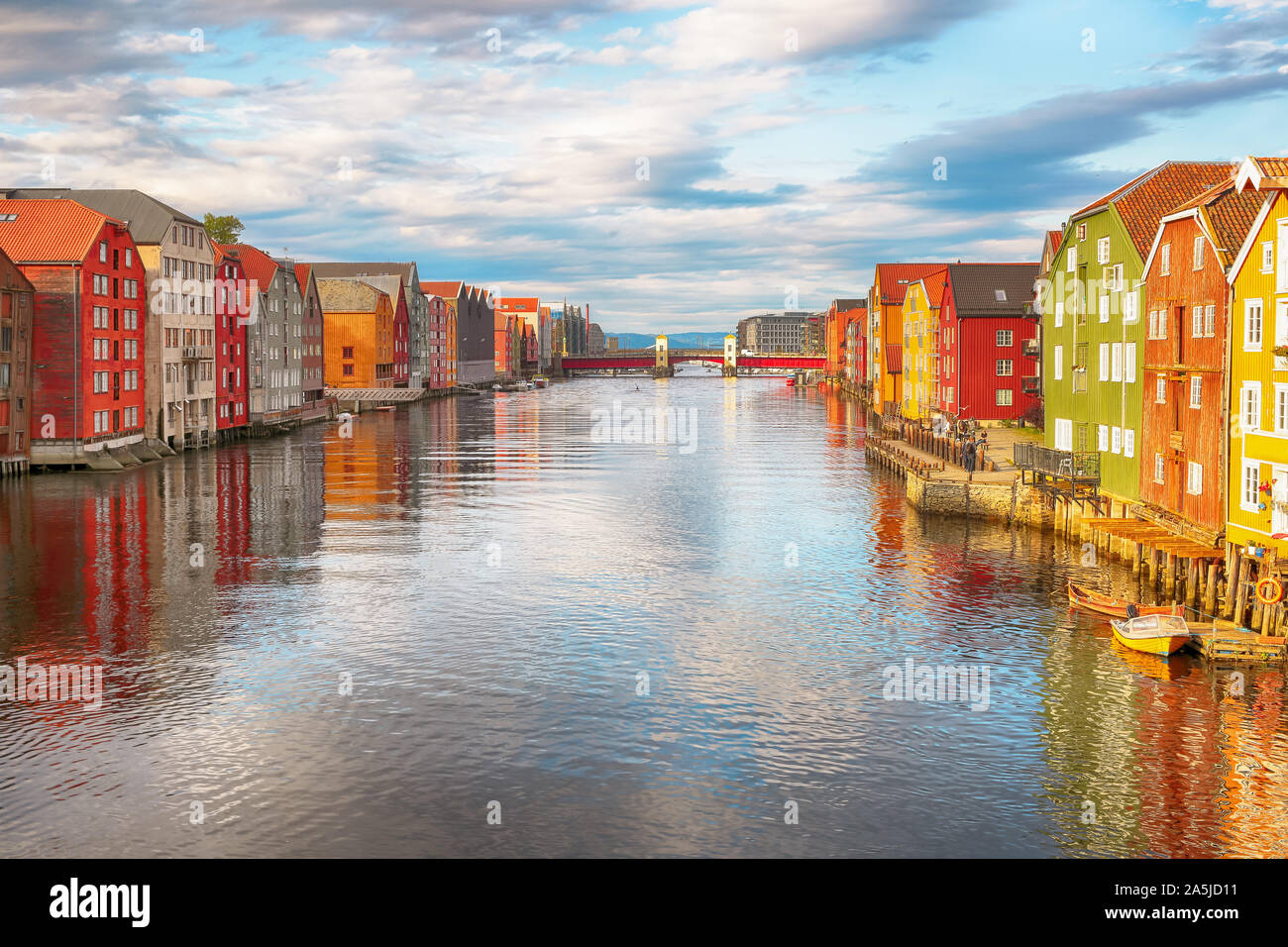 River Nidelva, the bridge Bakke Bru and old timber buildings along the ...