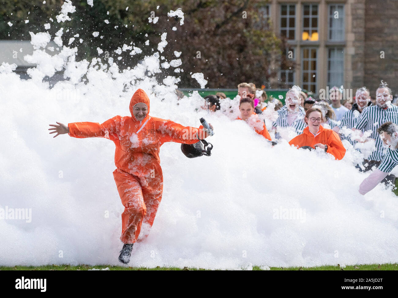 Hundreds of students take part in the traditional Raisin Monday foam ...
