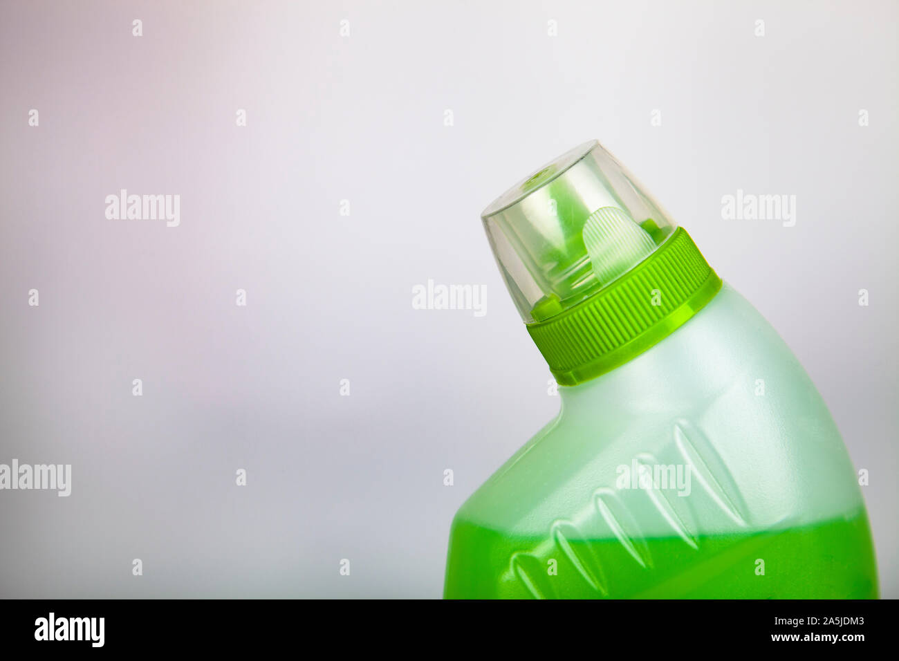 Cleaning agent on a light background Stock Photo - Alamy