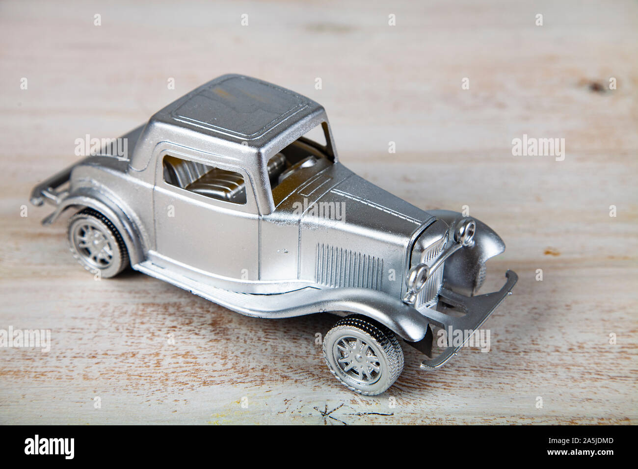 Shiny silver toy car hi-res stock photography and images - Alamy