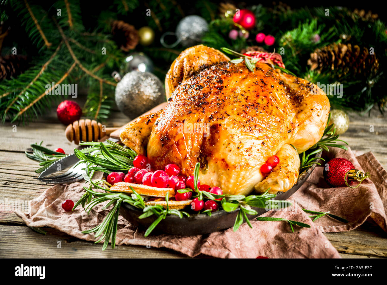 Traditional Christmas and Thanksgiving roasted whole chicken with fruit ...