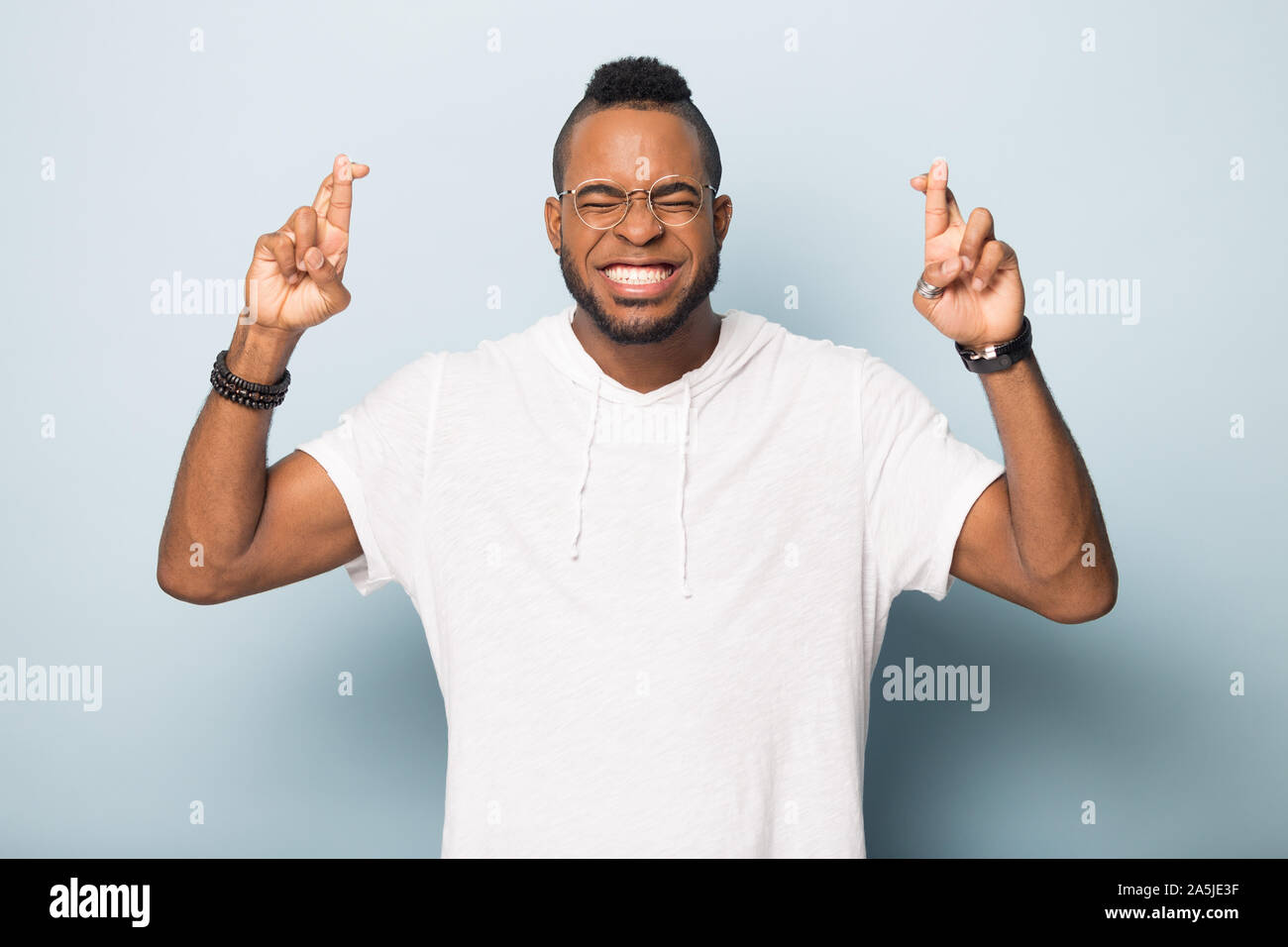 Man making cross gesture hi-res stock photography and images - Alamy