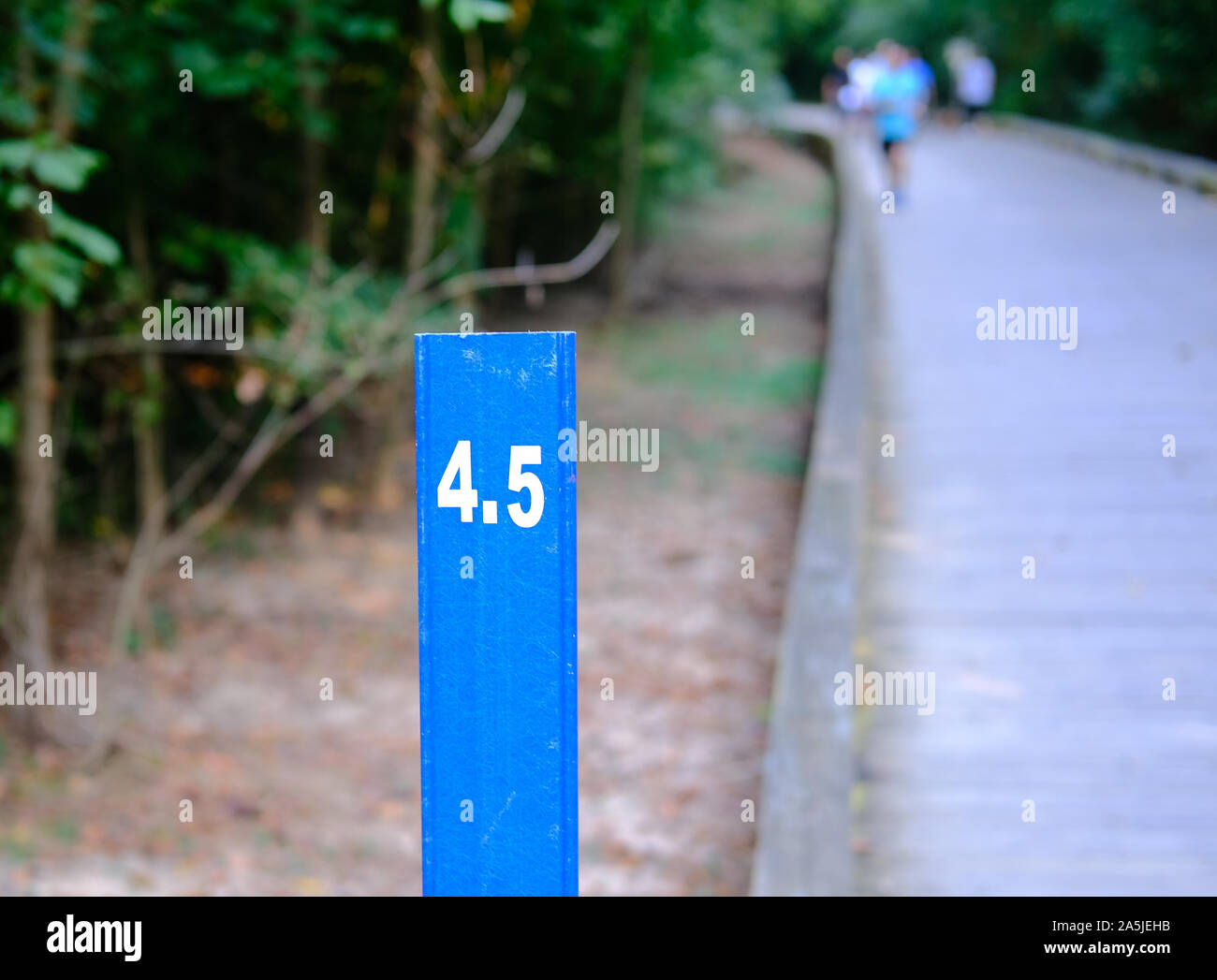 Runners Approaching 4.5 Miles Stock Photo - Alamy