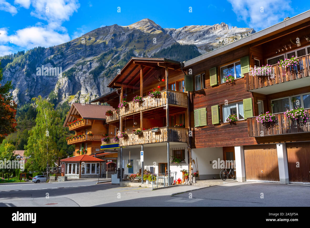 Kandersteg, Switzerland street view with colorful wooden houses in ...