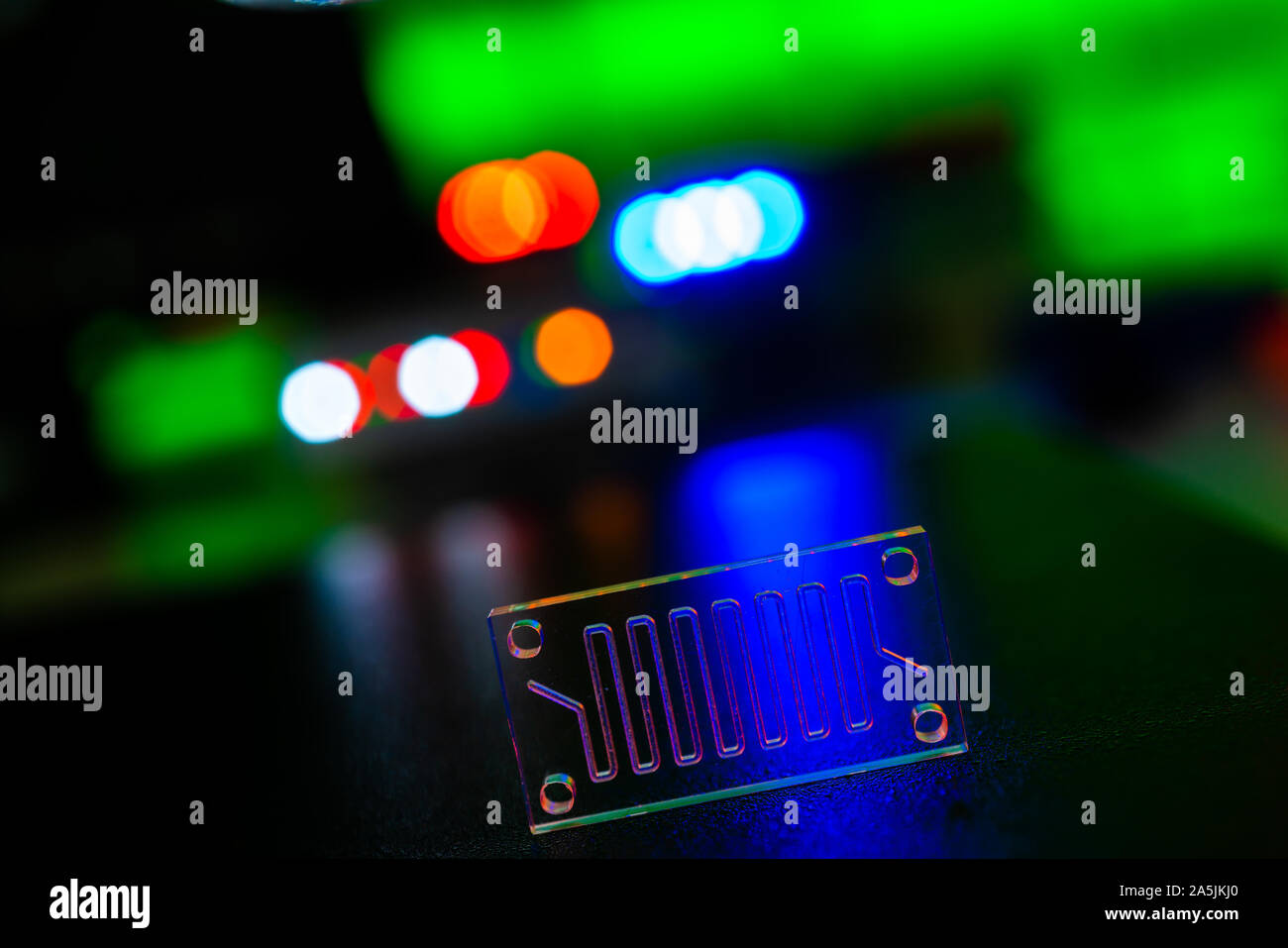 microfluidic device Instrument that uses micro amounts of fluid on a ...