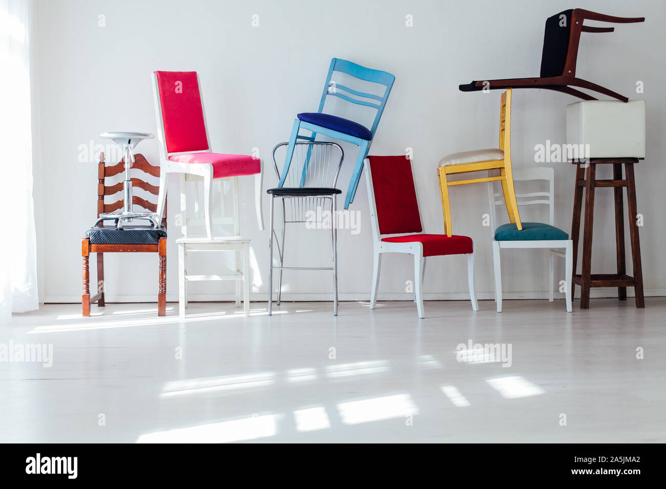 lots of different chairs in the interior of an empty office Stock Photo ...