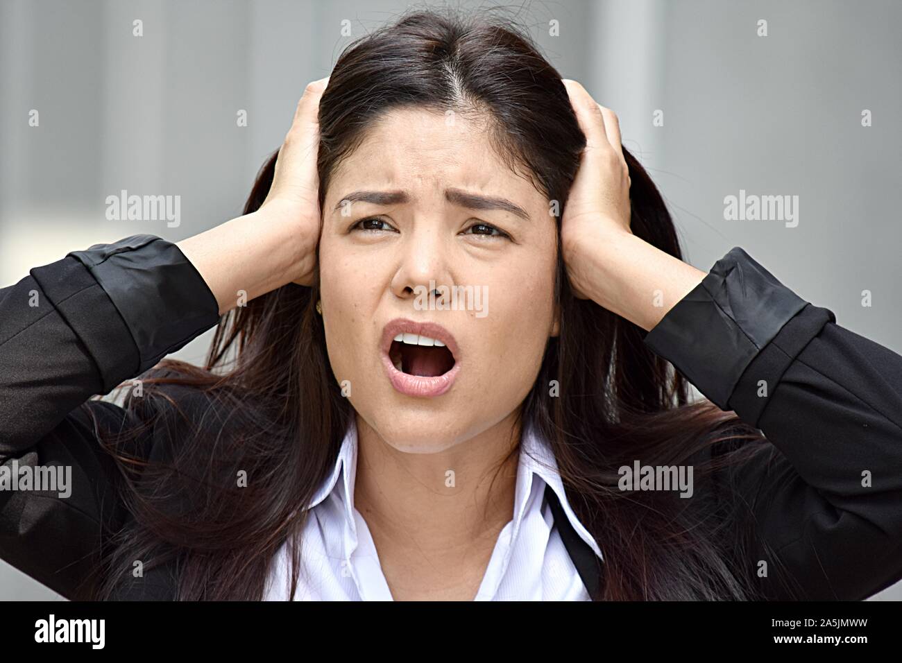 Stressed Business Woman Wearing Suit Stock Photo - Alamy