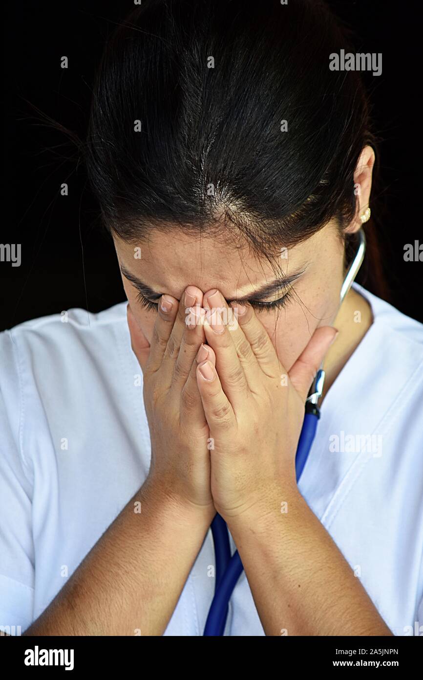 Female Nurse And Depression Stock Photo - Alamy