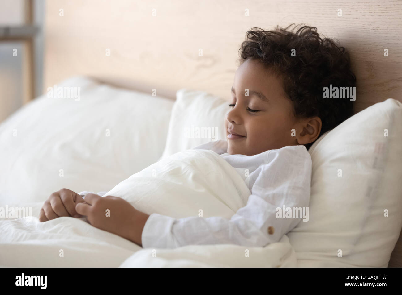 African american boy sleeping hi-res stock photography and images - Alamy