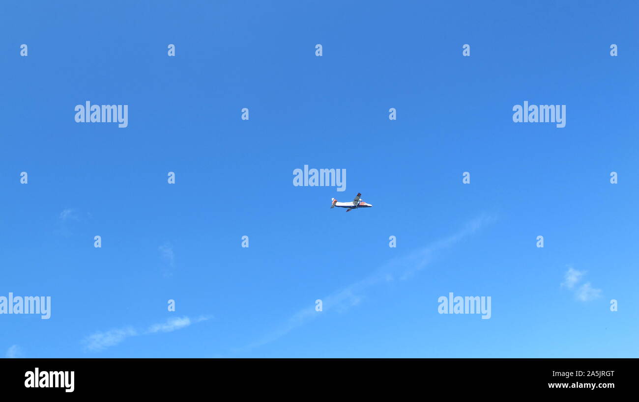 A small plane in the sky Stock Photo - Alamy