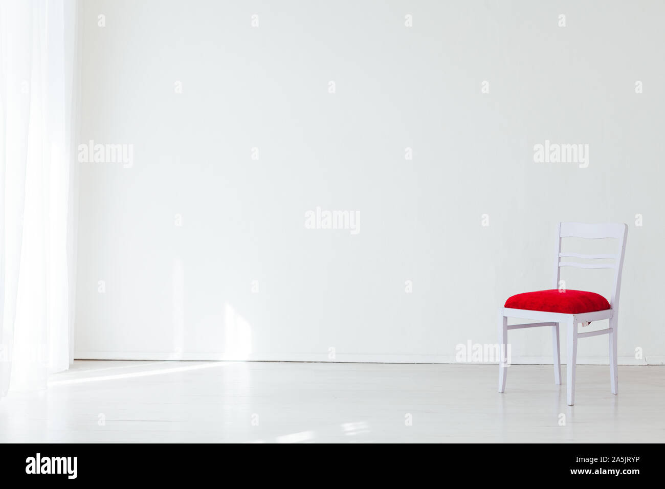 one vintage chair in the interior of an empty white room Stock Photo ...