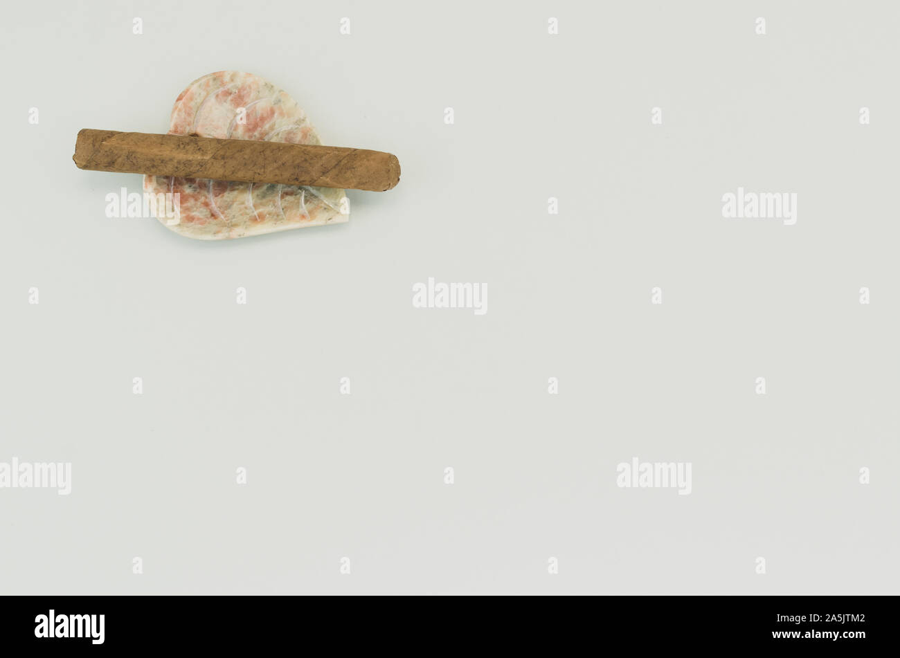 new cigar top view - paper background with copy space Stock Photo - Alamy