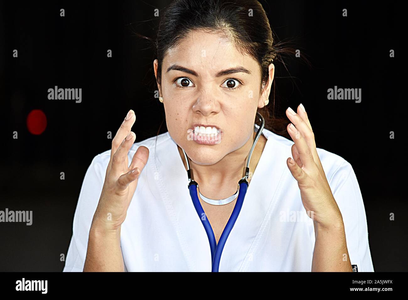 An Anxious Female Nurse Stock Photo - Alamy