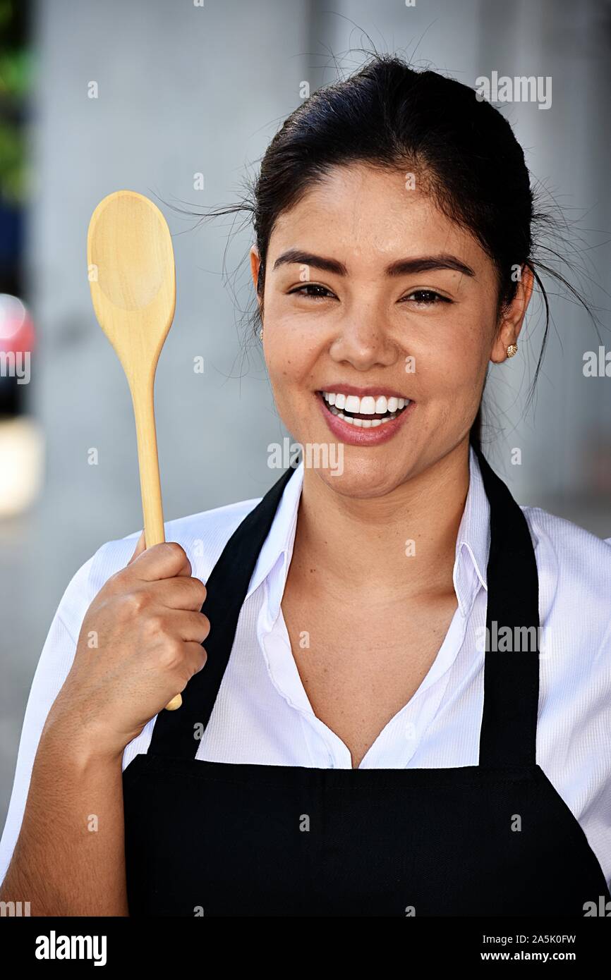Adult Female Chef Or Cook Laughing Stock Photo - Alamy