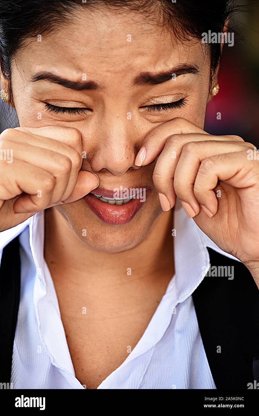 Crying Hispanic Business Woman Stock Photo - Alamy