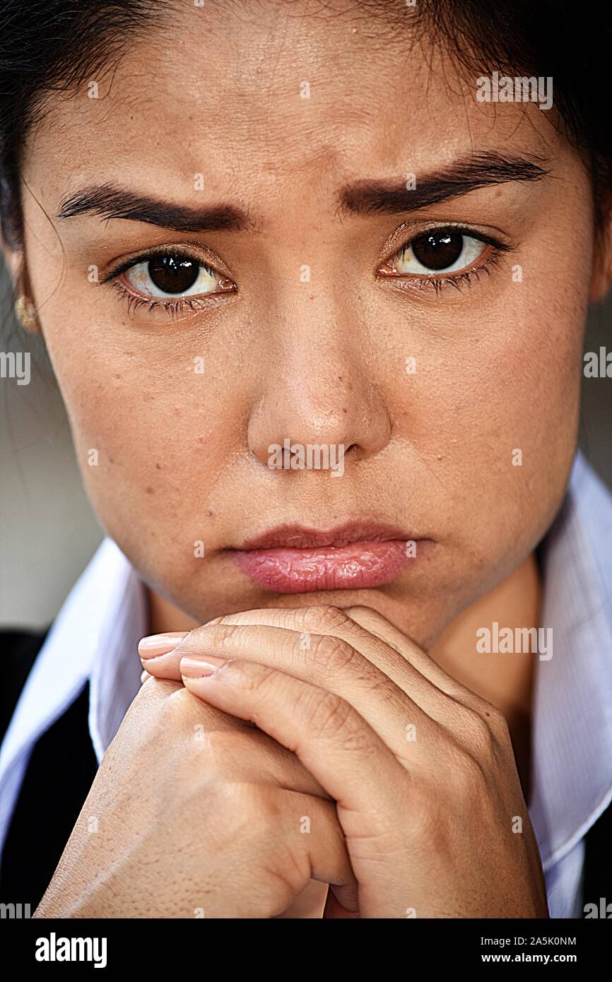 An Intelligent Business Woman Begging Stock Photo - Alamy