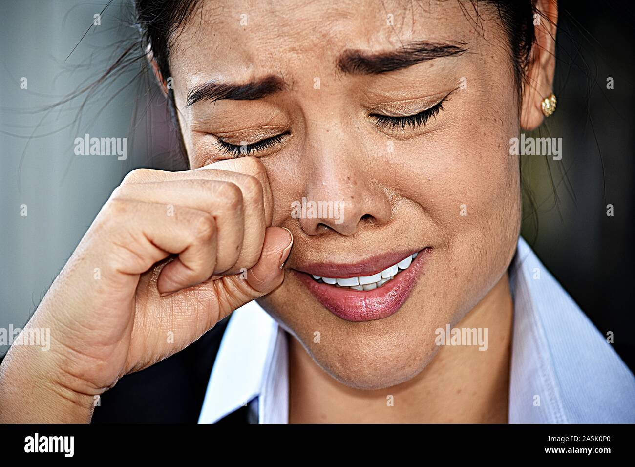 Tearful Diverse Business Woman Wearing Suit Stock Photo - Alamy