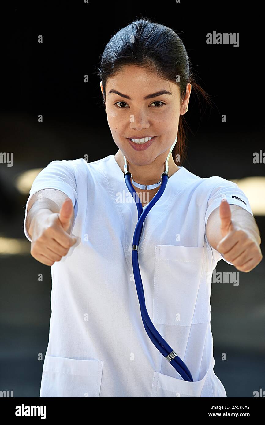Beautiful Female Nurse And Happiness Wearing Scrubs Stock Photo - Alamy