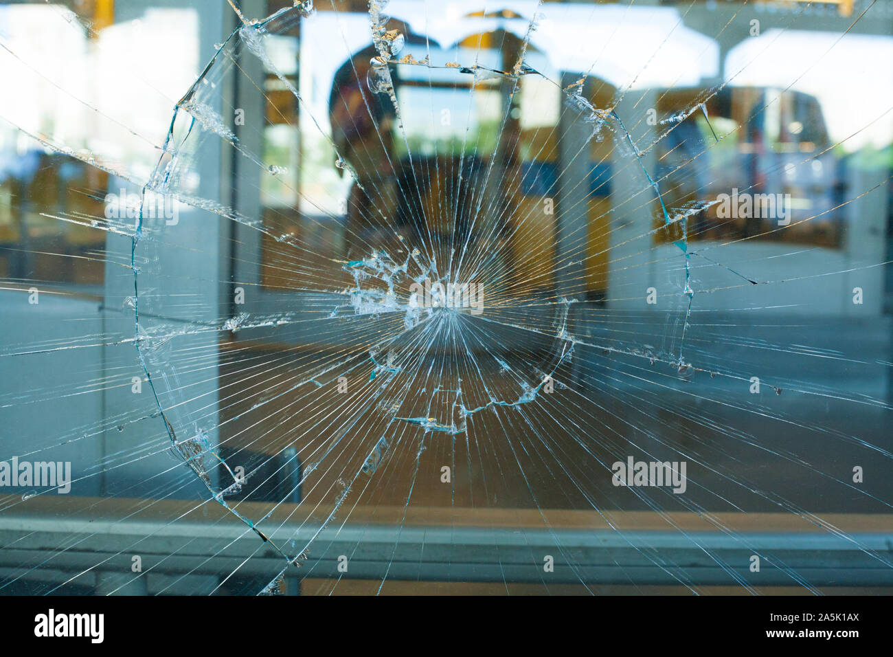 Broken Glass Pane. Smashed Blue Glass Stock Photo - Alamy