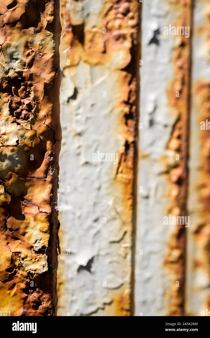 Close up of old rusty iron bridge railing. Peeling paint on metal Stock ...
