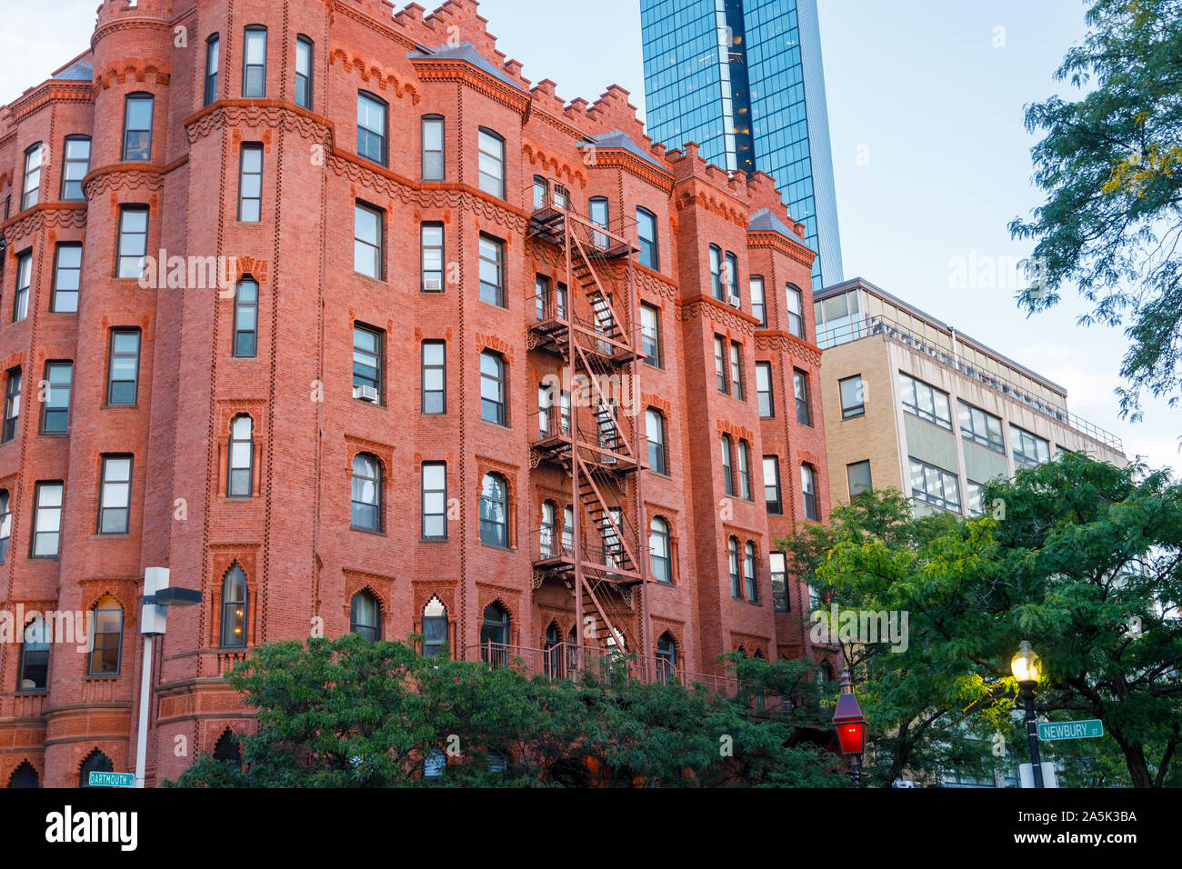 Typical external metal fire escape ladders on a red brick building in ...