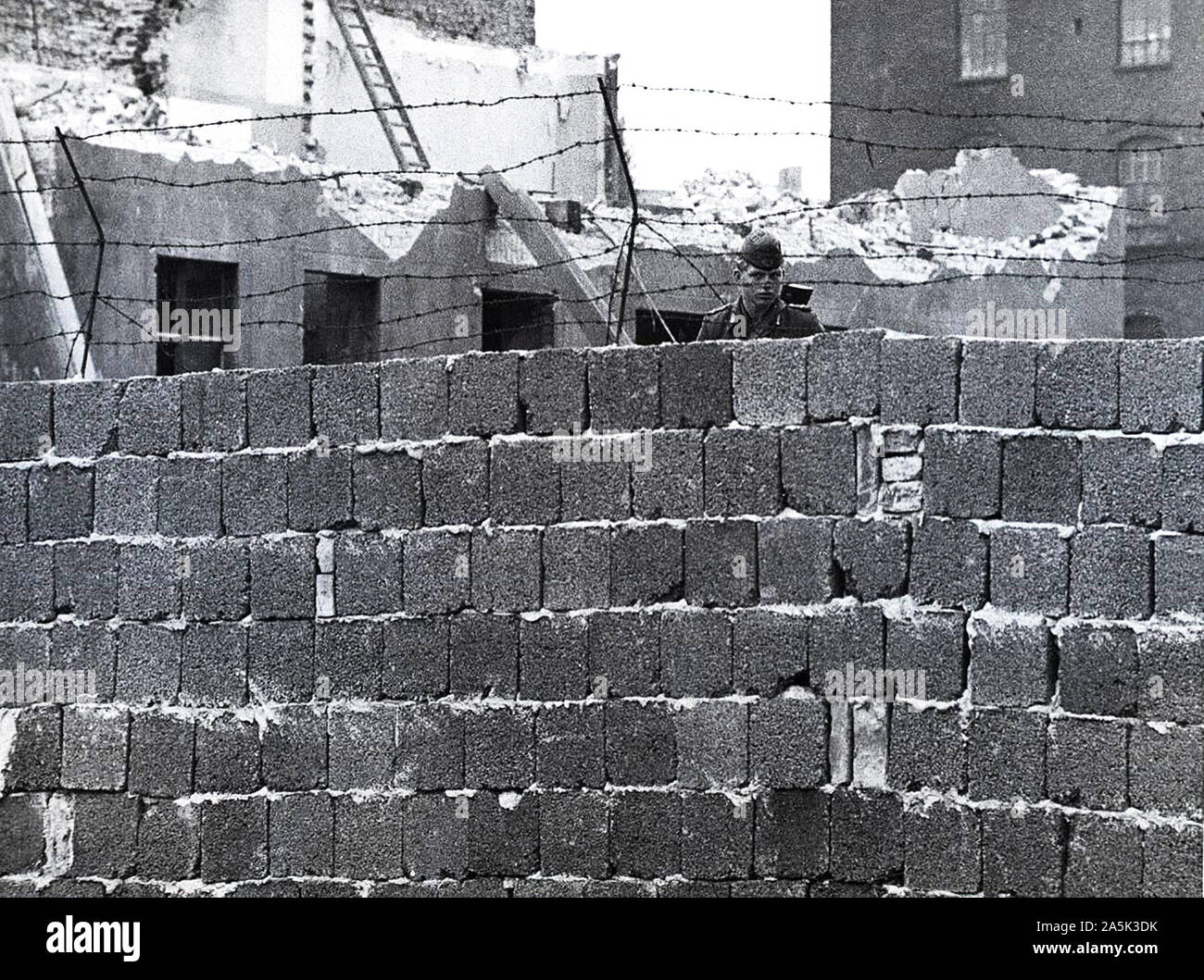 Berlin wall guard 1960s hi-res stock photography and images - Alamy