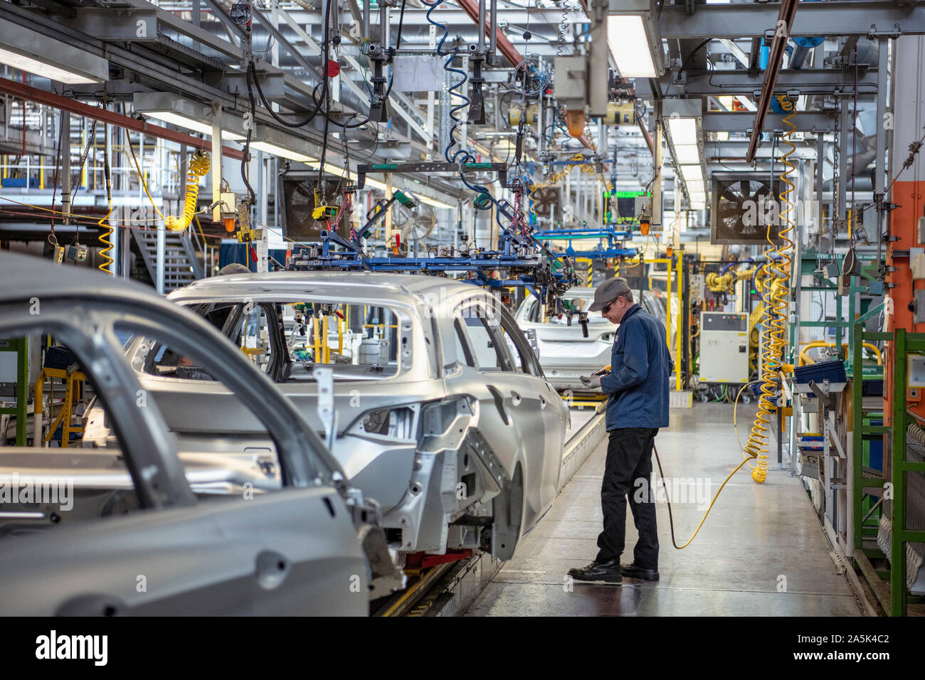 Group men one vehicle hi-res stock photography and images - Alamy