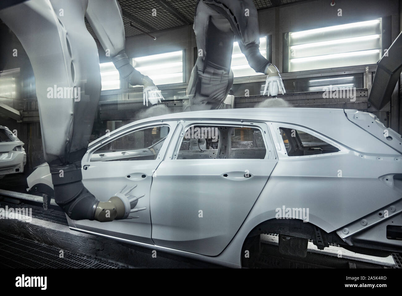 Car manufacturing robot paint hi-res stock photography and images - Alamy