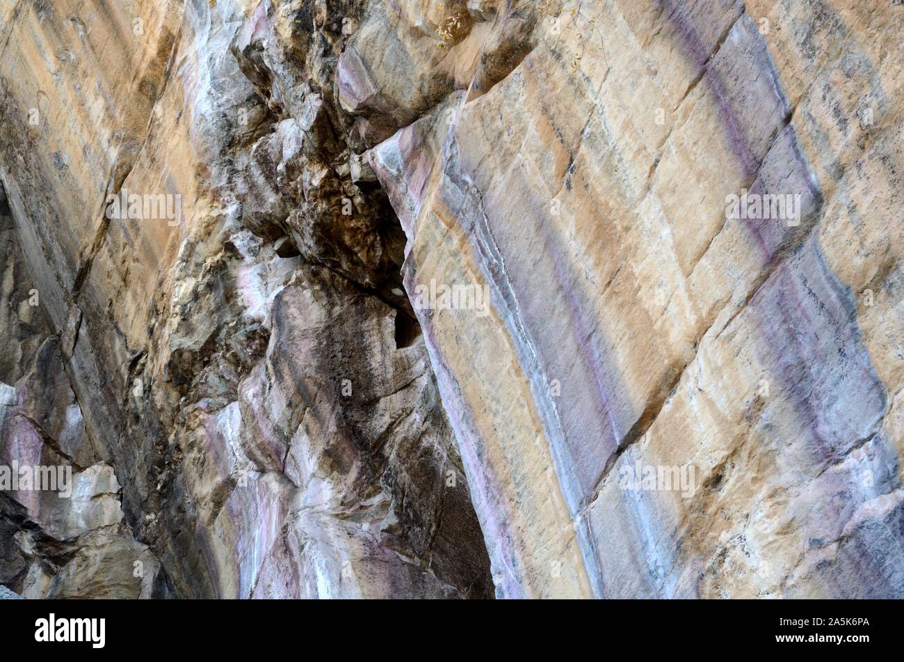 Colourful rock face formed by minerals and water Tsodilo Hills UNESCO ...