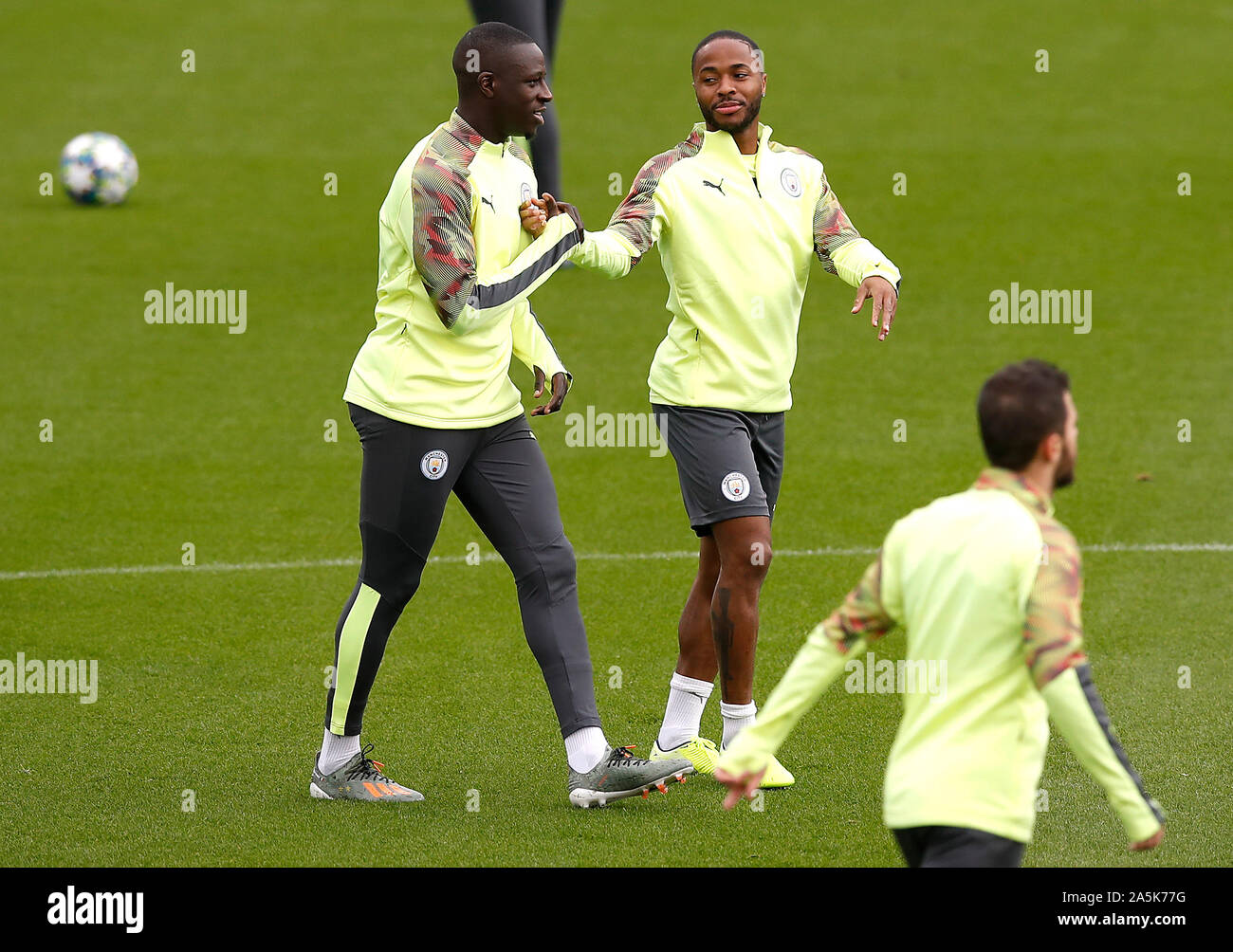 Manchester City's Benjamin Mendy (left) and Raheem Sterling during the ...